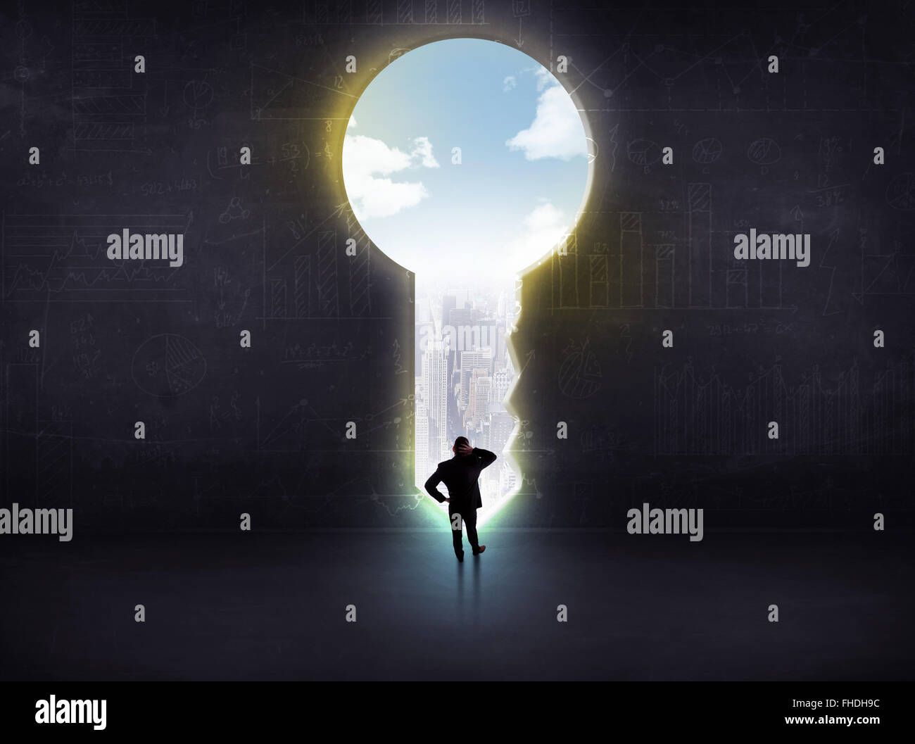 businessman looking a big key Stock Photo - Alamy