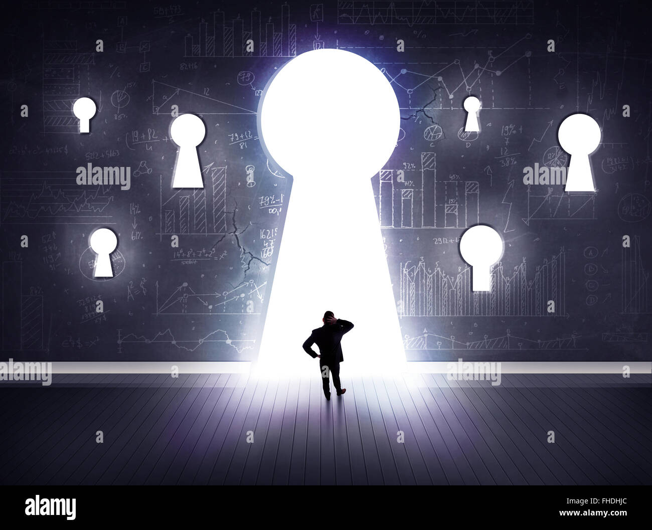 businessman looking through keyhole Stock Photo - Alamy