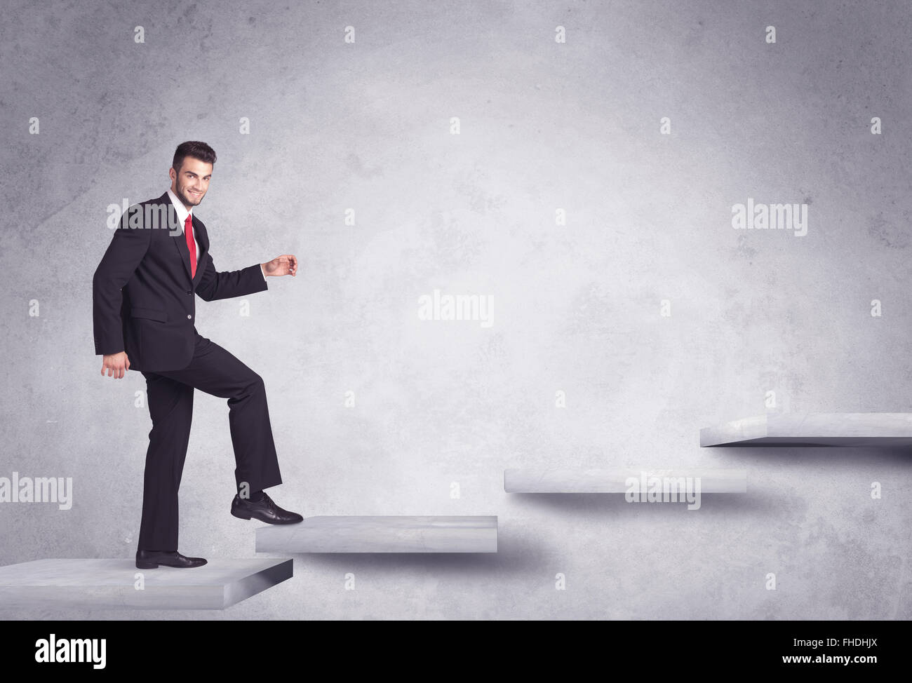 Stepping up a staircase Stock Photo - Alamy