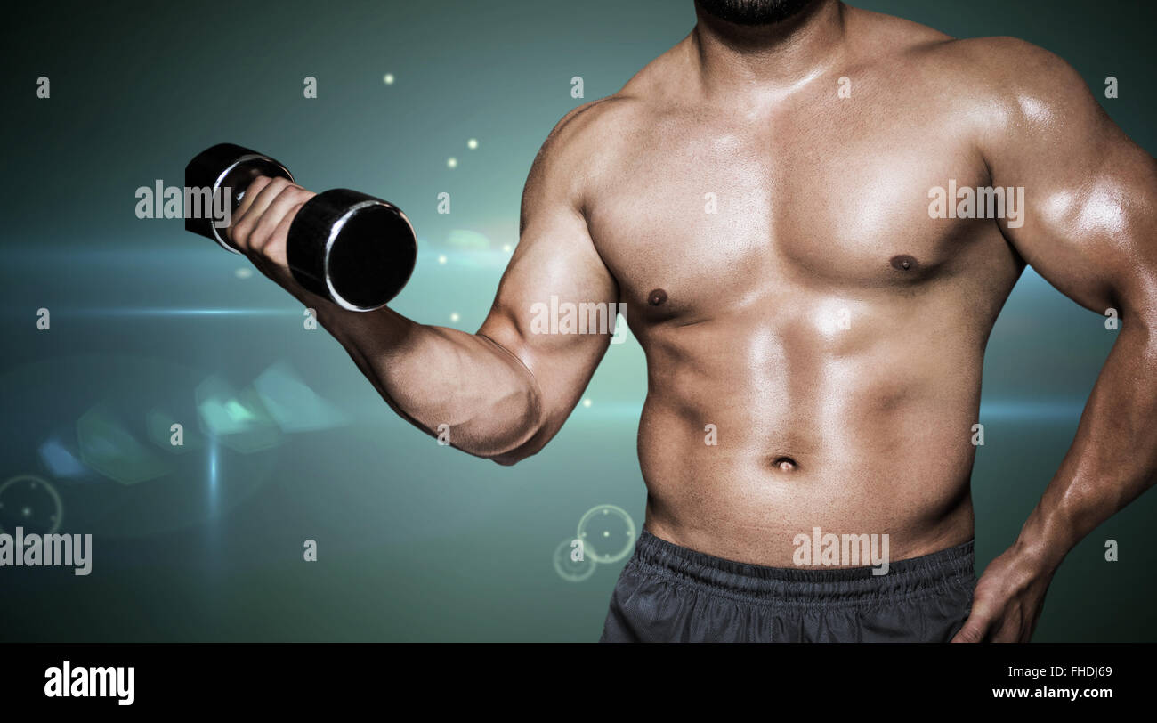 Composite image of mid section of a bodybuilder with dumbbell Stock ...