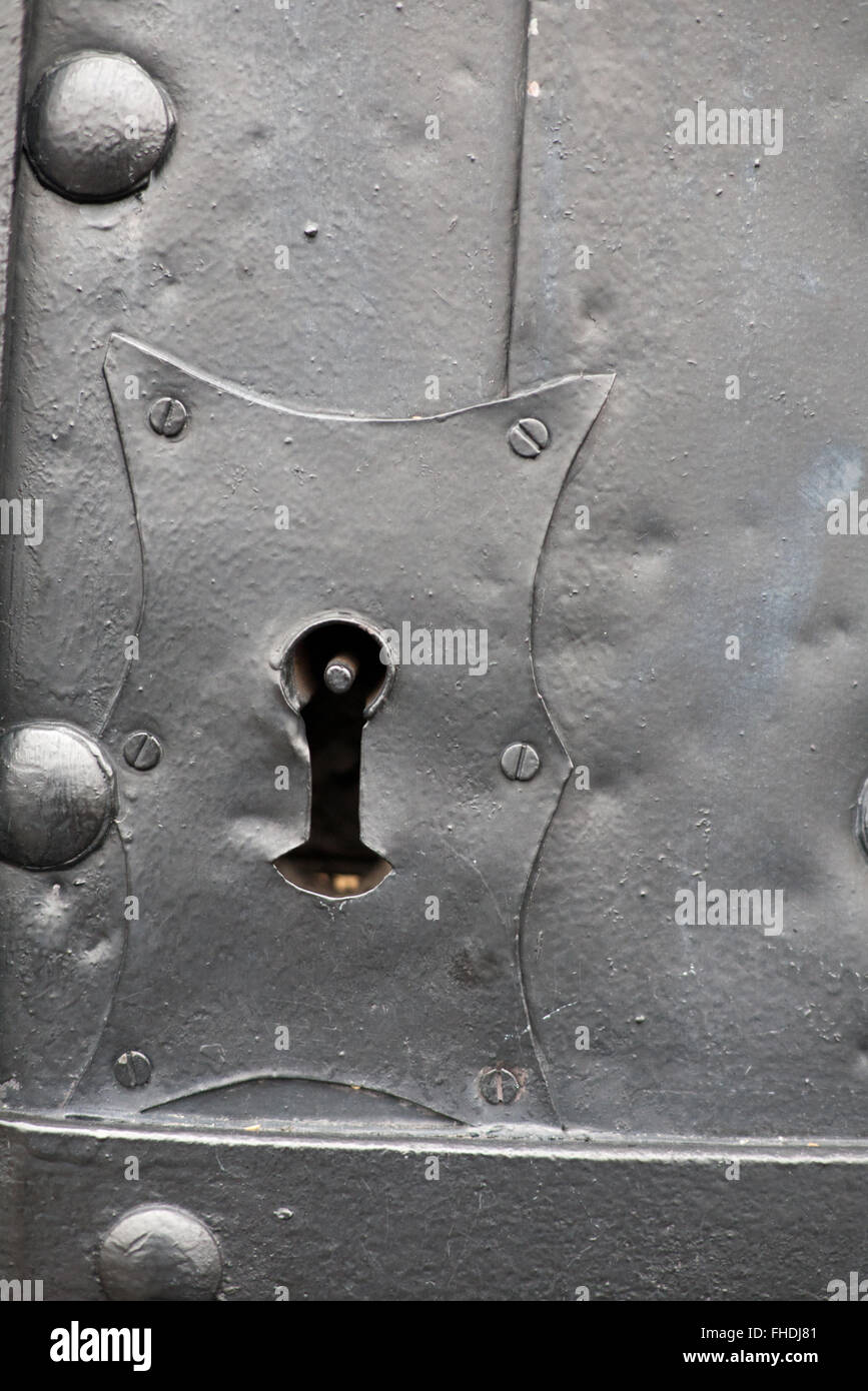 old style metal armored wall with keyhole closeup Stock Photo - Alamy