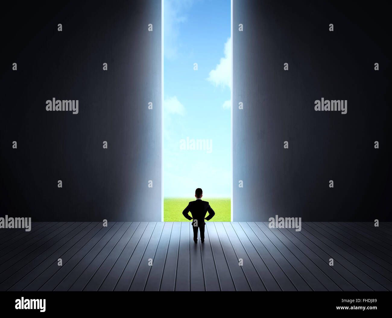 businessman walking to open gate Stock Photo - Alamy