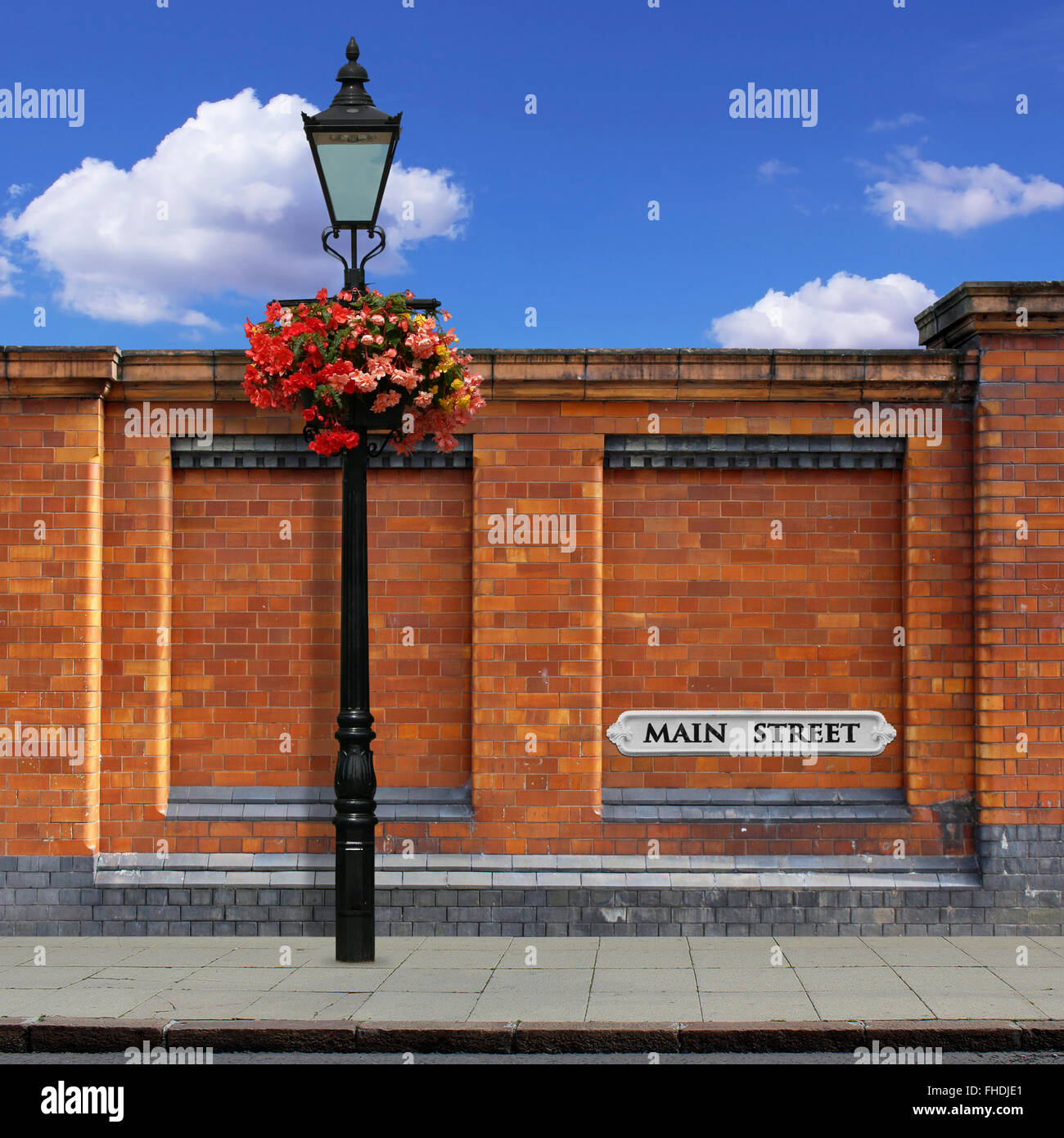 Red brick wall with flowers hi-res stock photography and images - Alamy