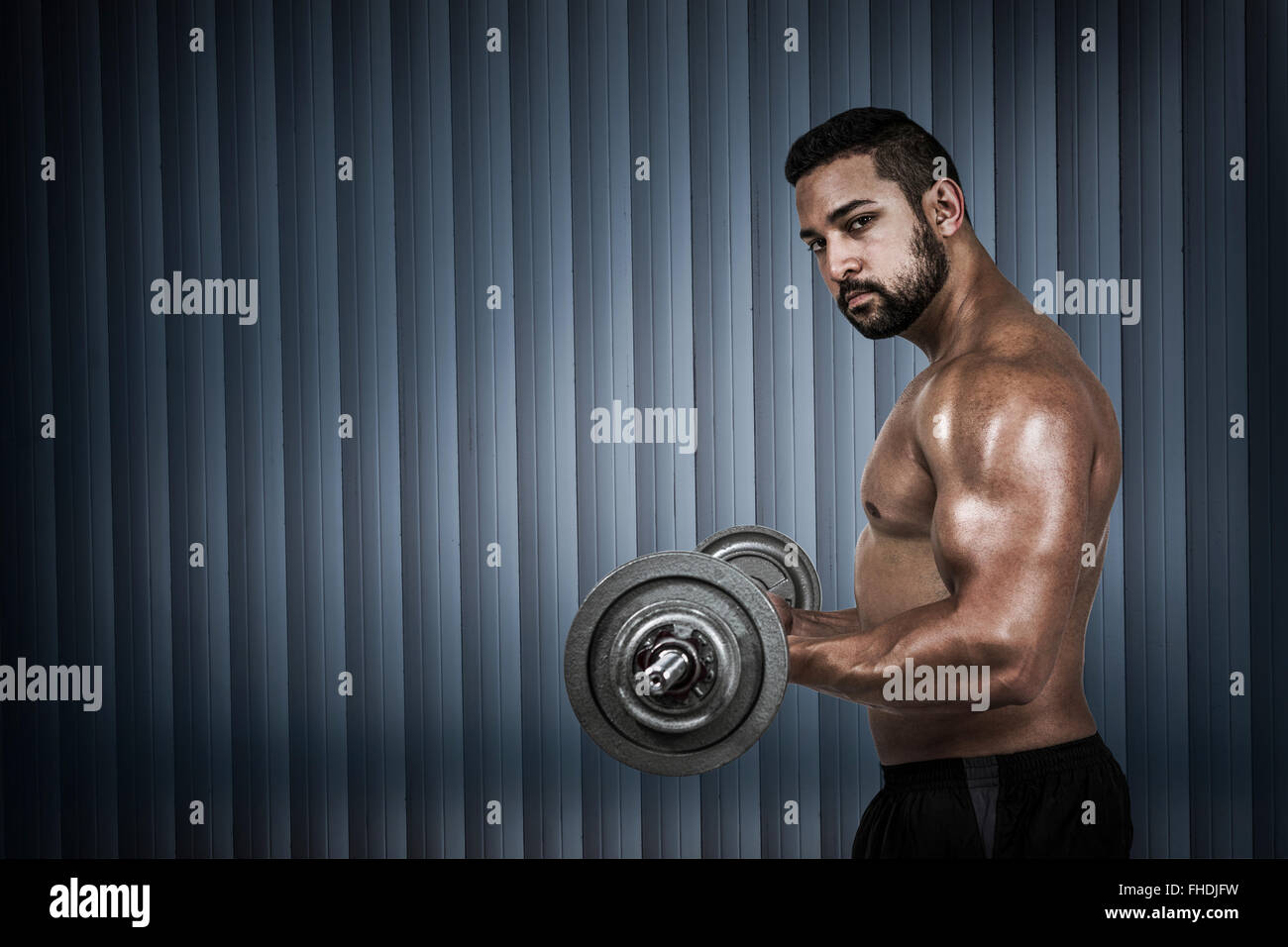 Composite image of muscular man lifting heavy barbell Stock Photo - Alamy
