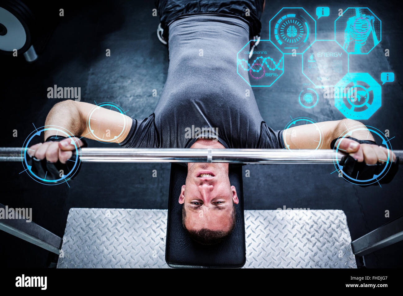 Composite image of man working out in gym Stock Photo - Alamy