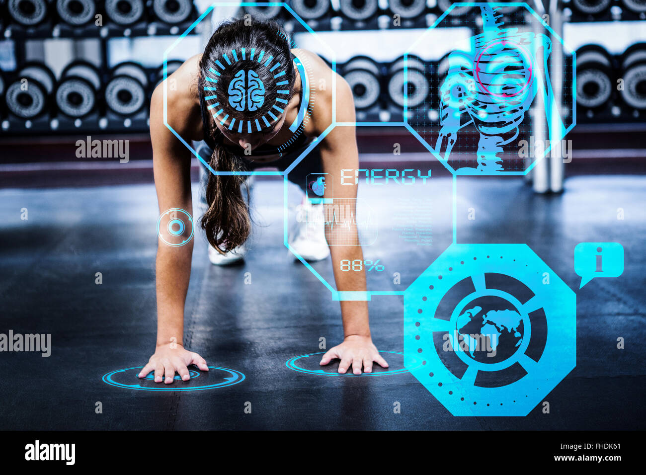 Composite image of woman working out in gym Stock Photo - Alamy