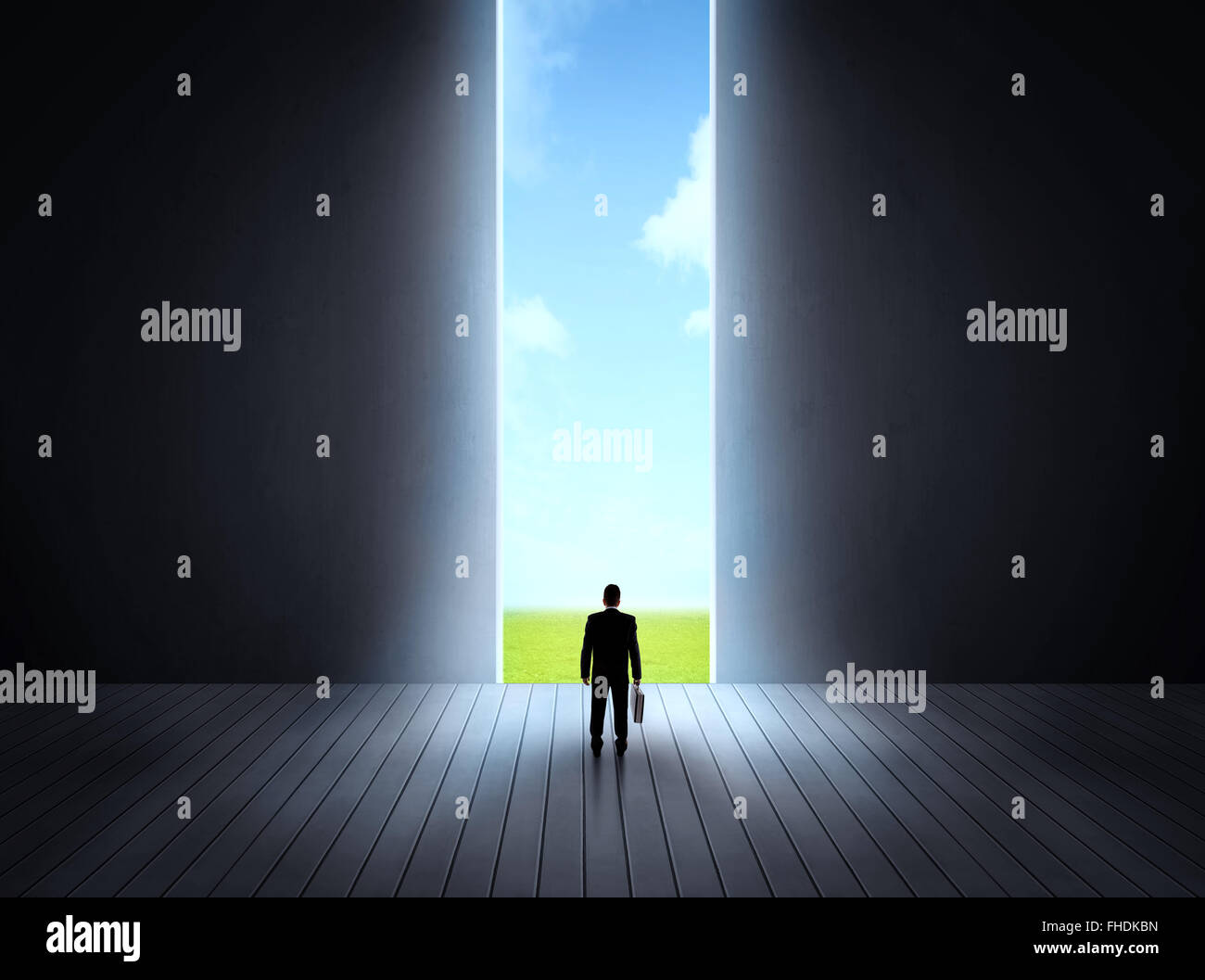 businessman walking to open gate Stock Photo - Alamy