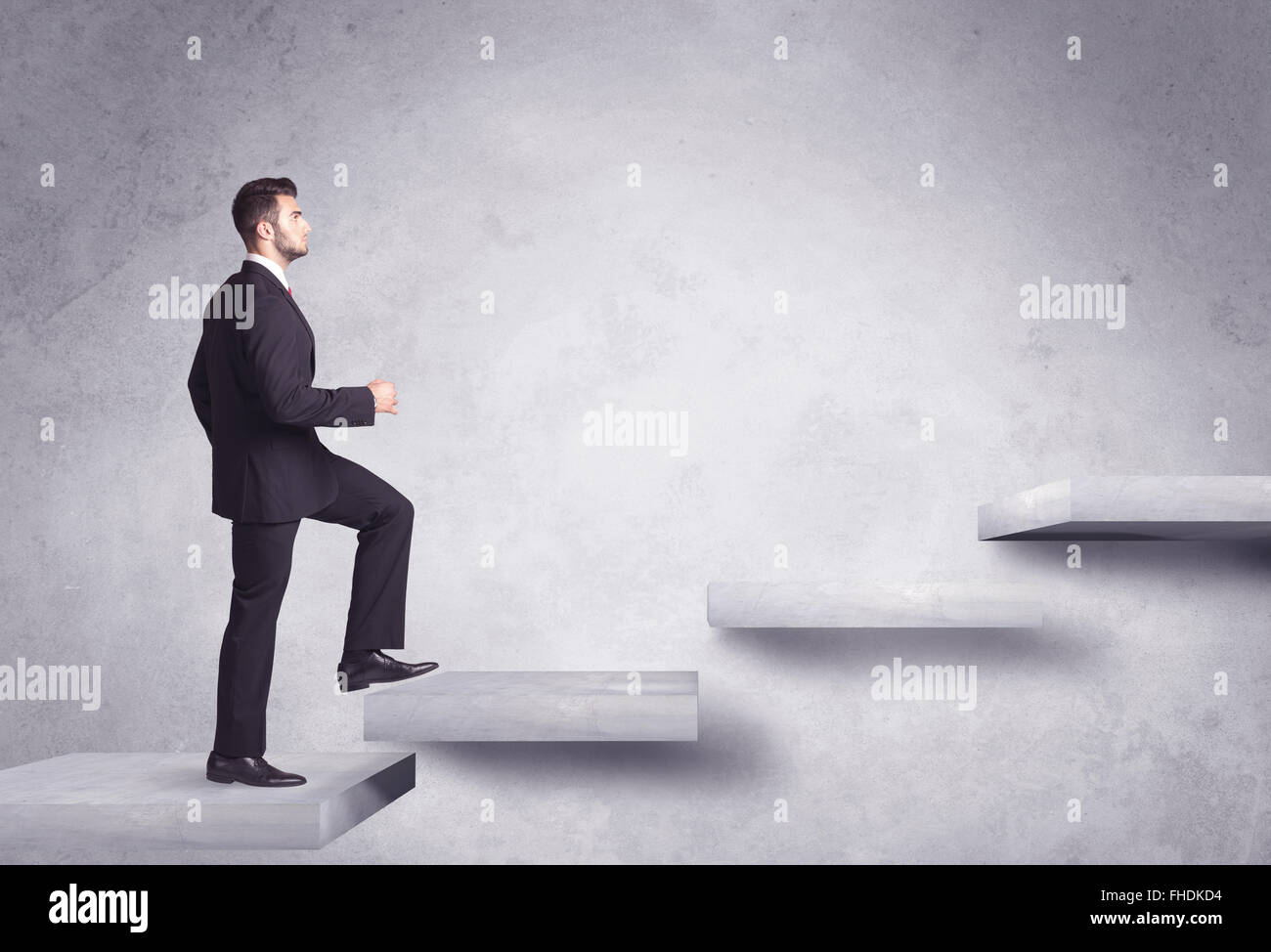 Stepping up a staircase Stock Photo - Alamy