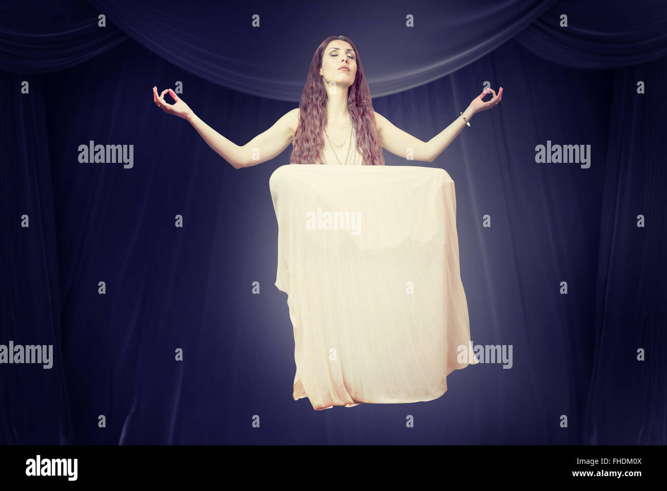 Composite image of portrait of woman levitating with eyes closed Stock ...