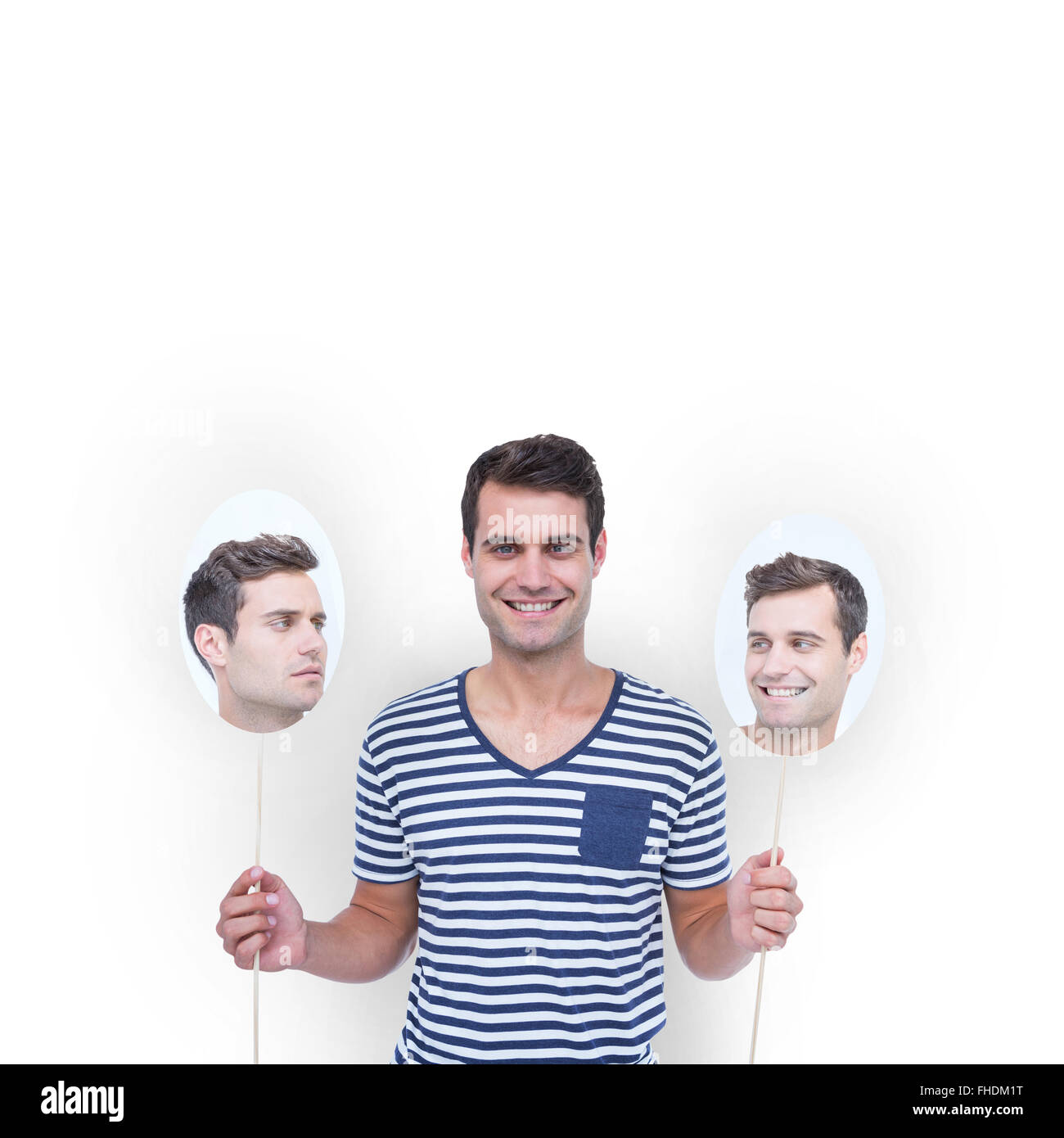Man holding balloons of his face Stock Photo - Alamy
