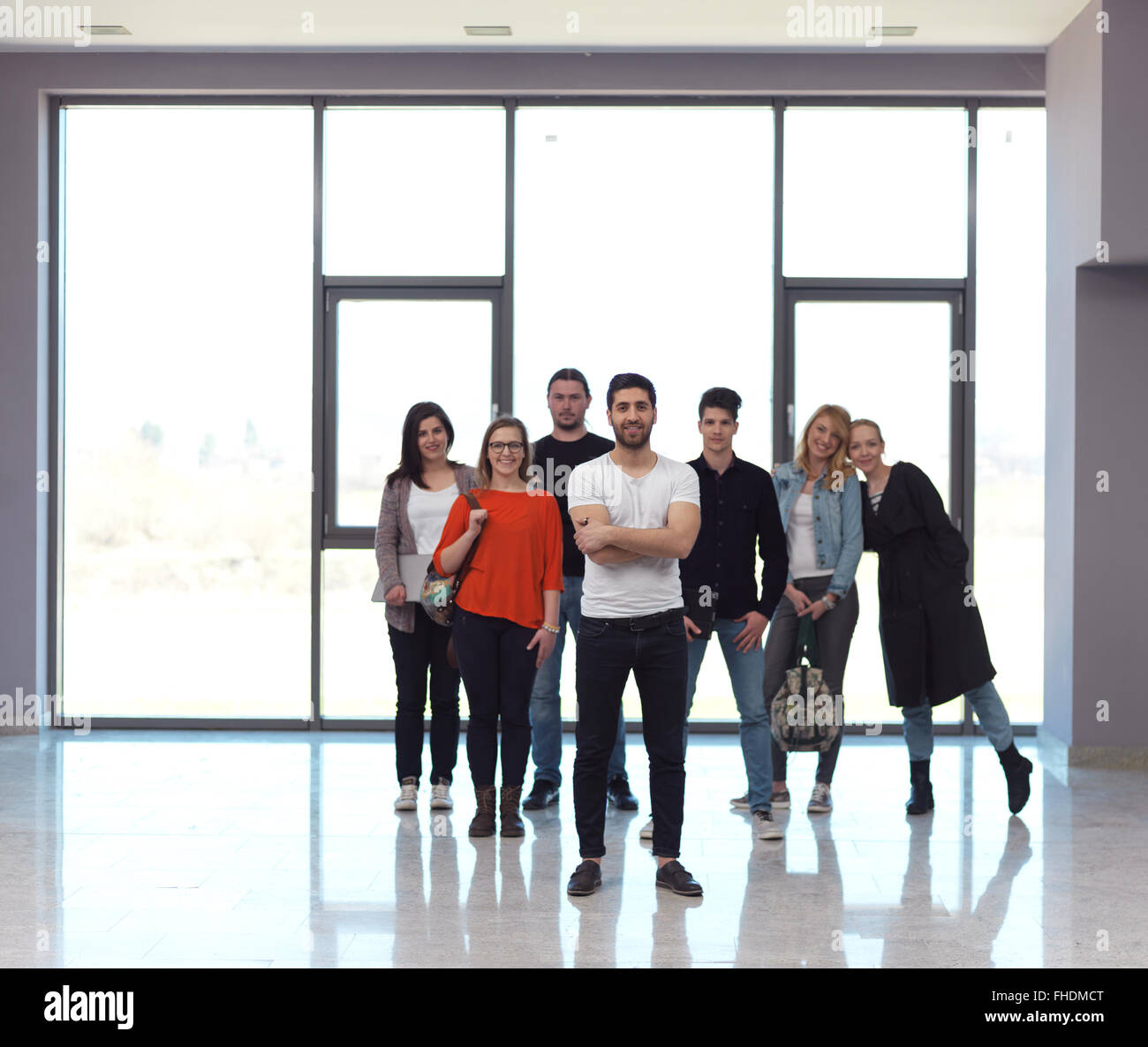students group standing together as team Stock Photo - Alamy