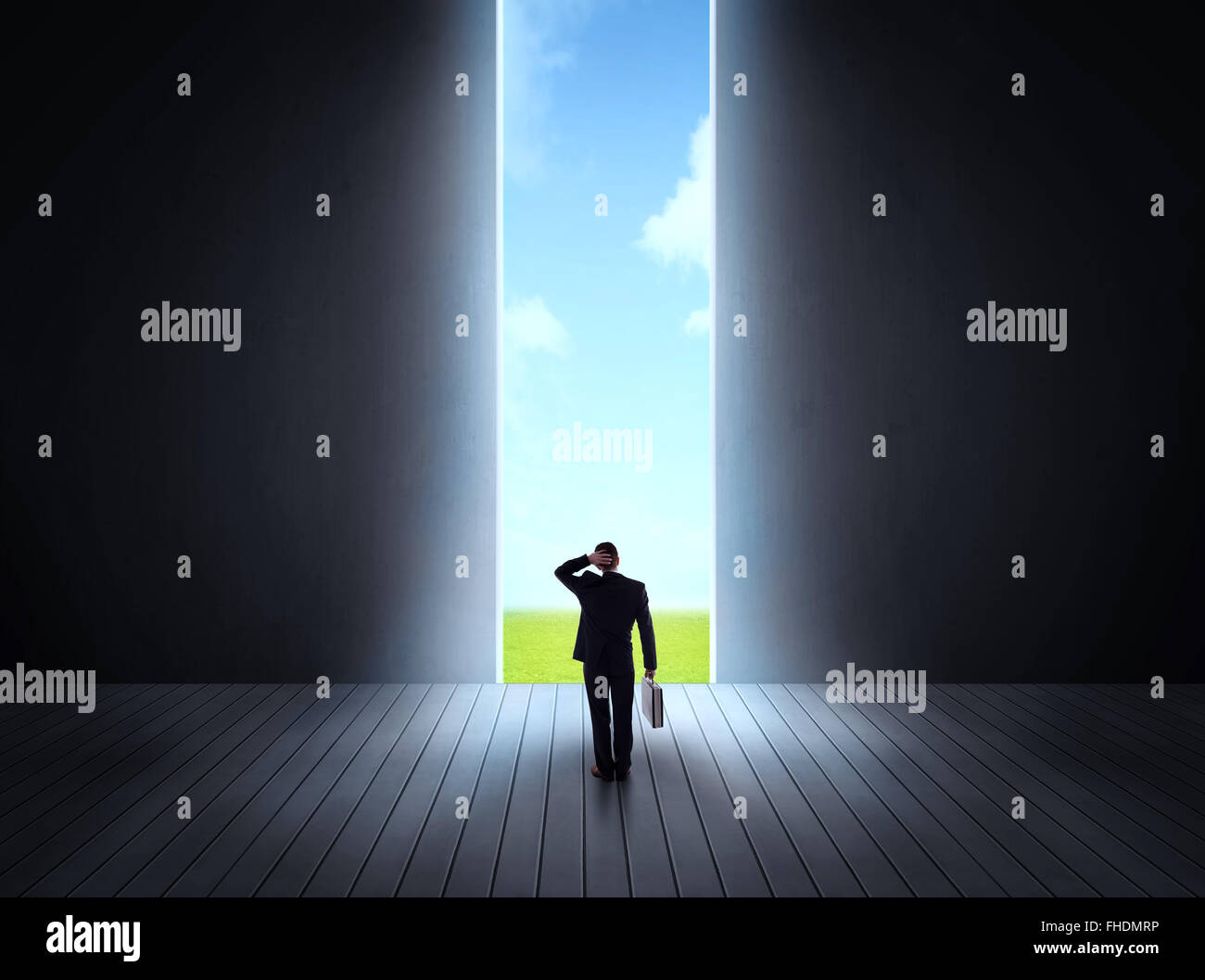 businessman walking to open gate Stock Photo - Alamy