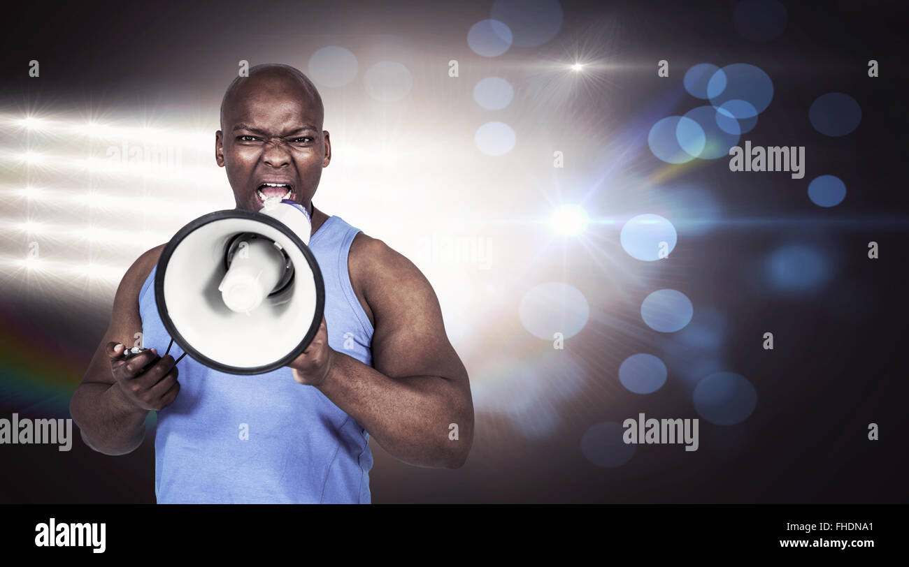 Composite image of fit trainer checking his stopwatch Stock Photo - Alamy