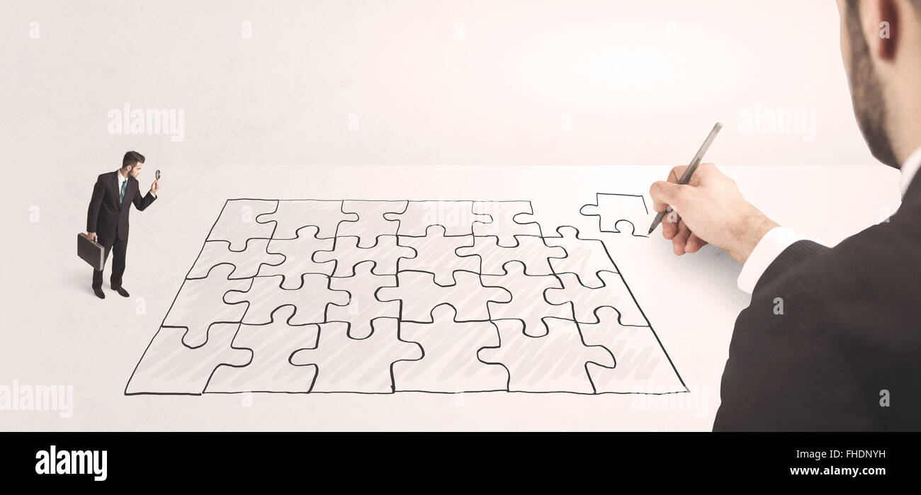 Business man looking at hand drawing solution Stock Photo - Alamy