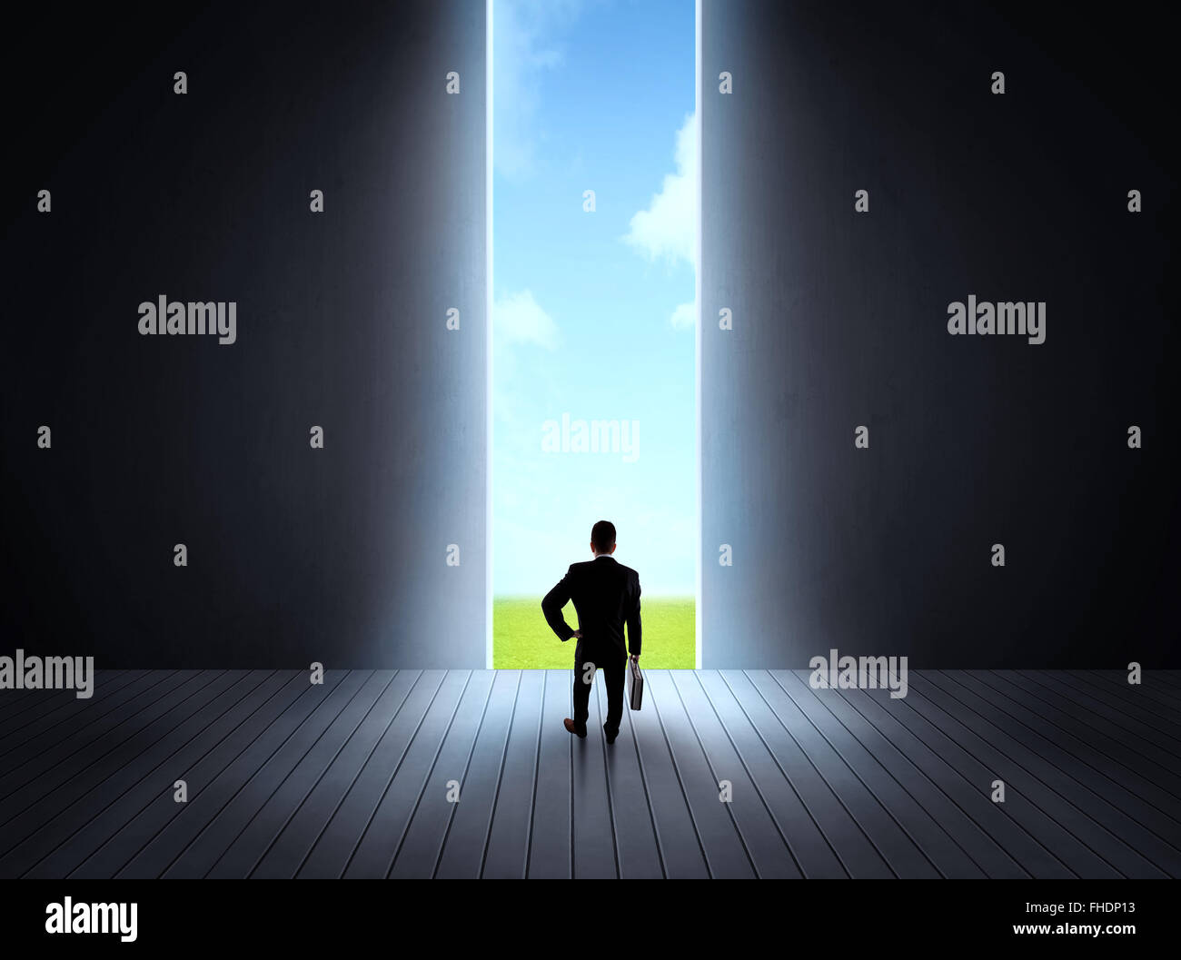 businessman walking to open gate Stock Photo - Alamy