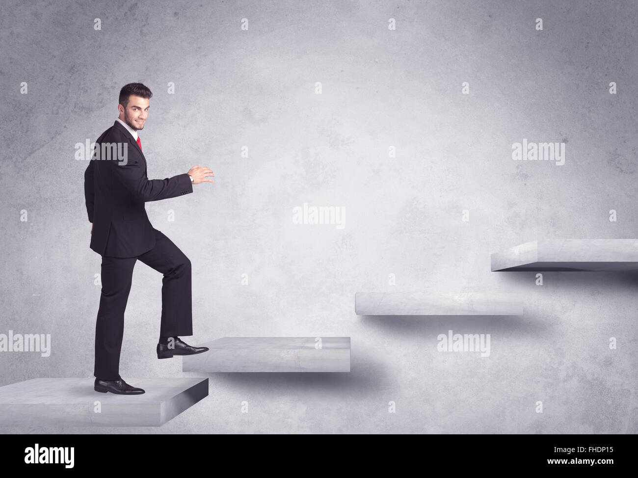 Stepping up a staircase Stock Photo - Alamy