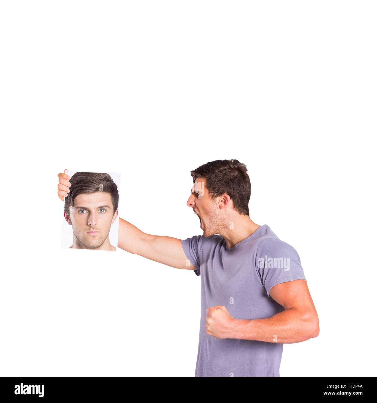 Man shouting at picture of himself Stock Photo - Alamy