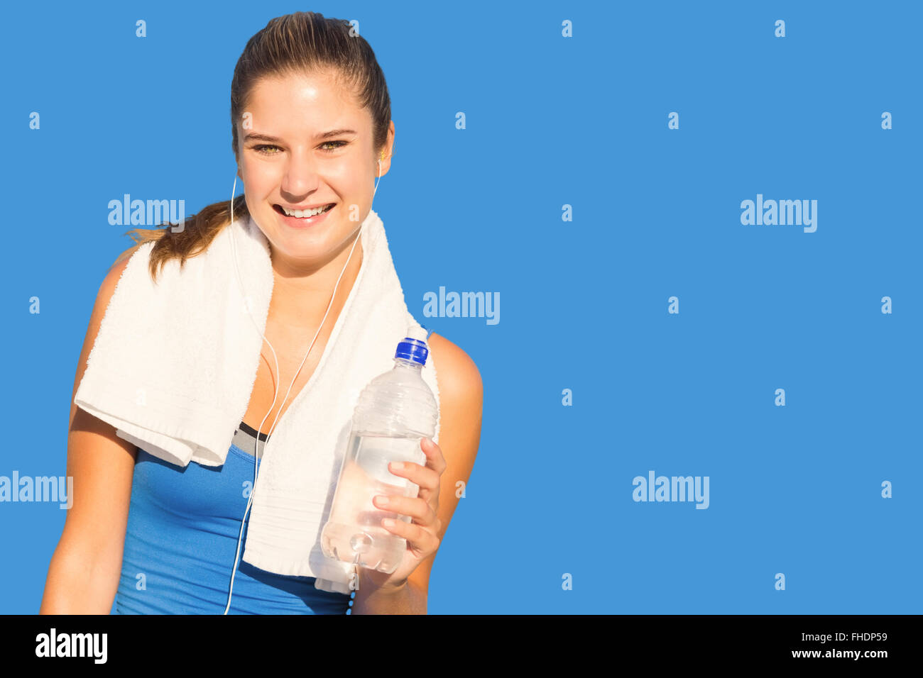 Composite image of fit woman with water Stock Photo - Alamy