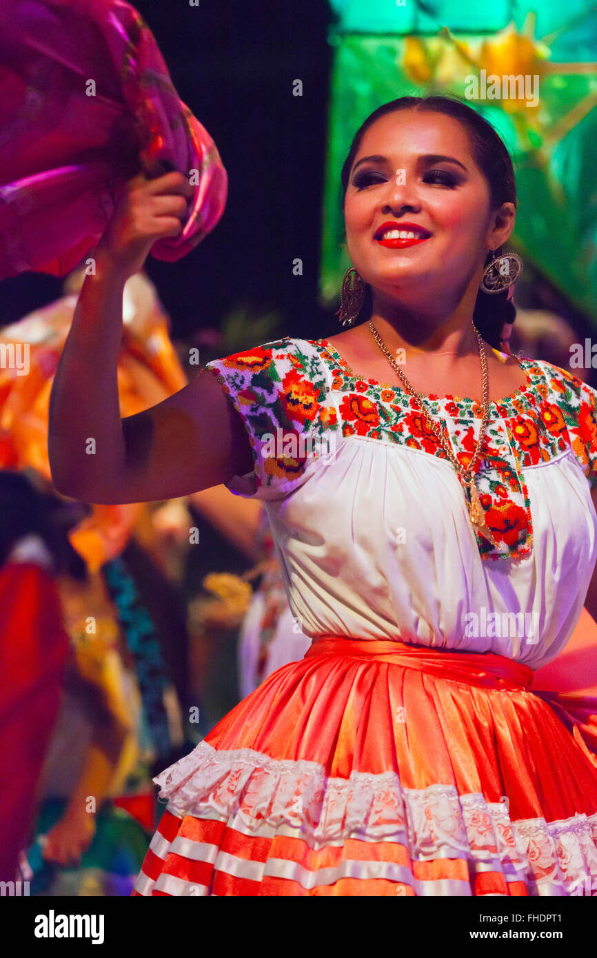A female FOLK DANCER performs in the Plaza de la Danza during the ...