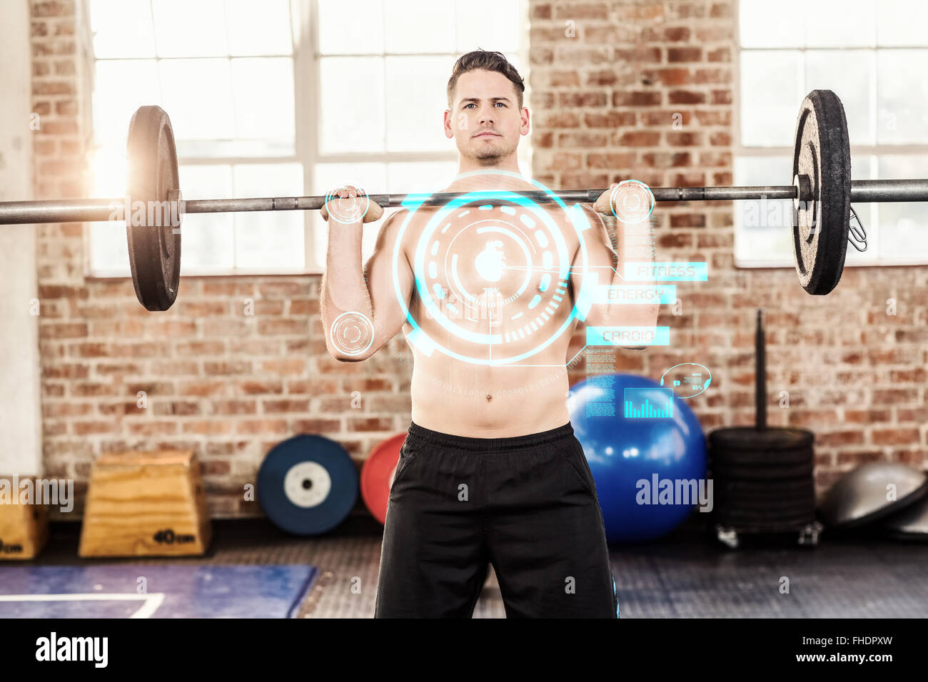 Composite image of muscular serious man doing weightlifting Stock Photo ...