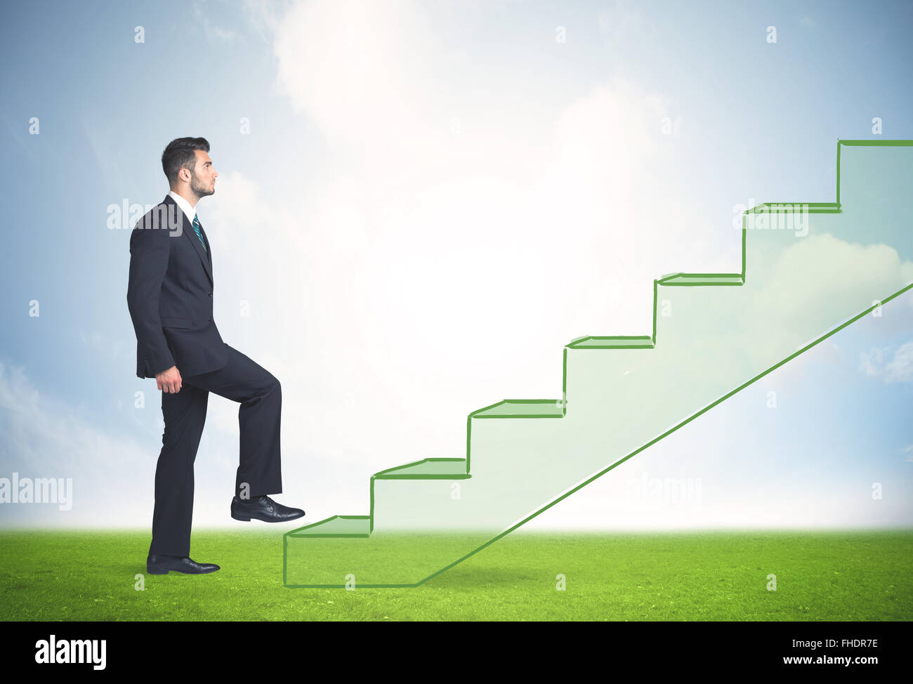 Stepping up a staircase Stock Photo - Alamy