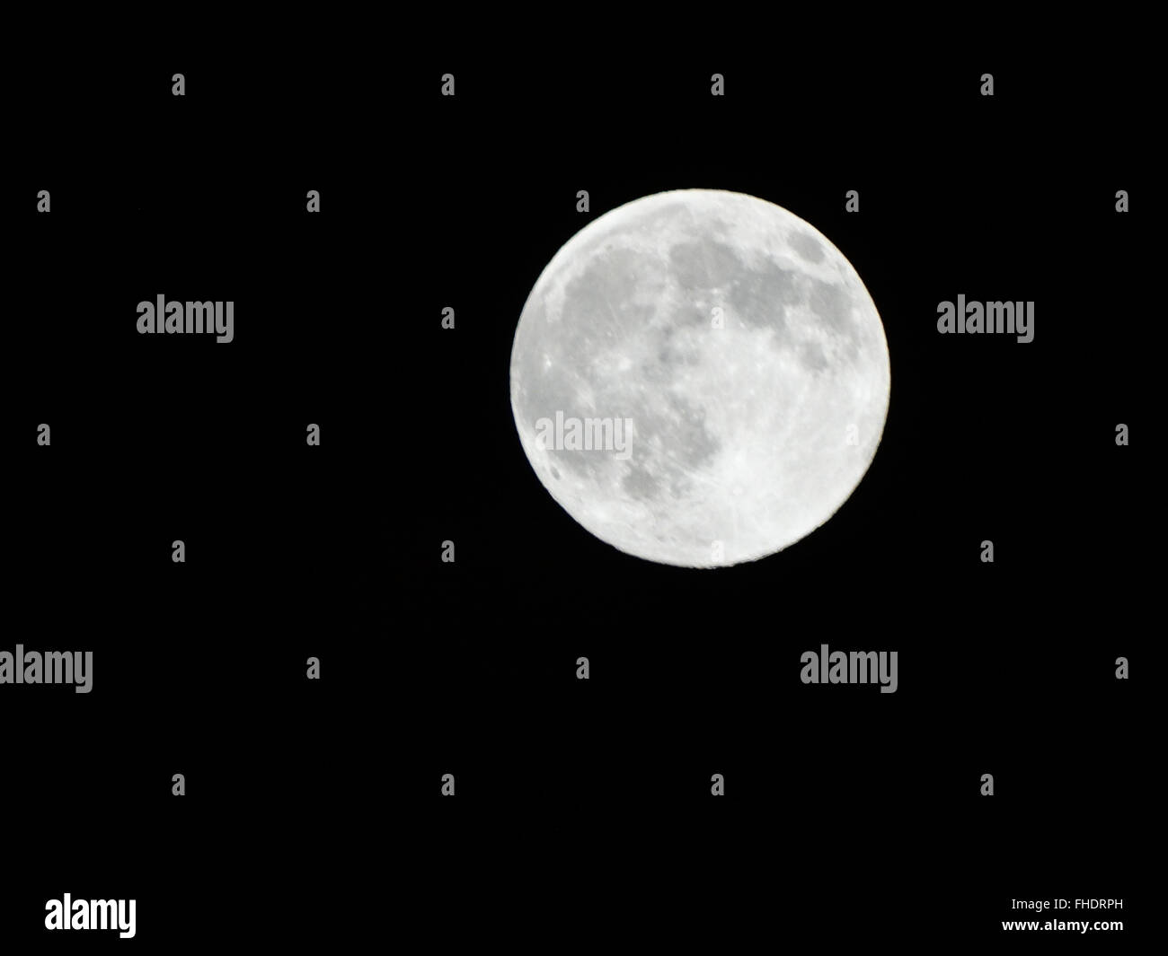 Full moon on clear black sky in Sunnyvale, California, sky black with ...