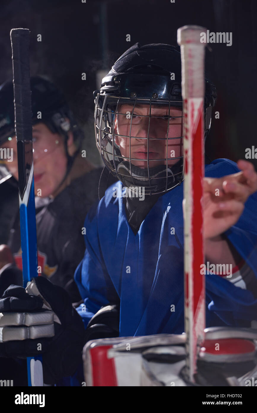 ice hockey players on bench Stock Photo - Alamy