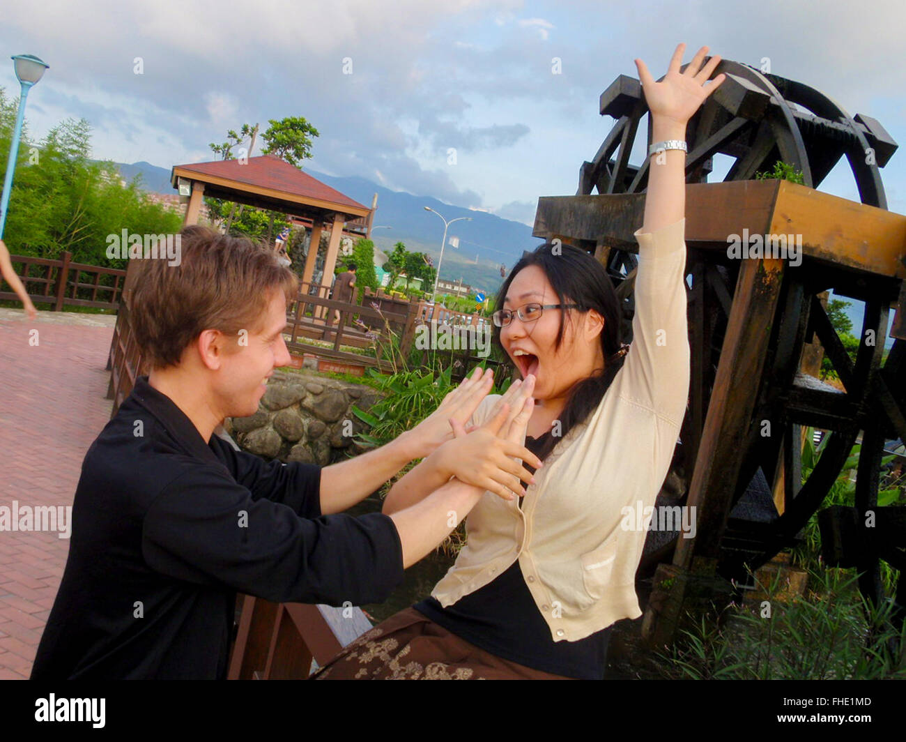 A couple mucking about Stock Photo - Alamy