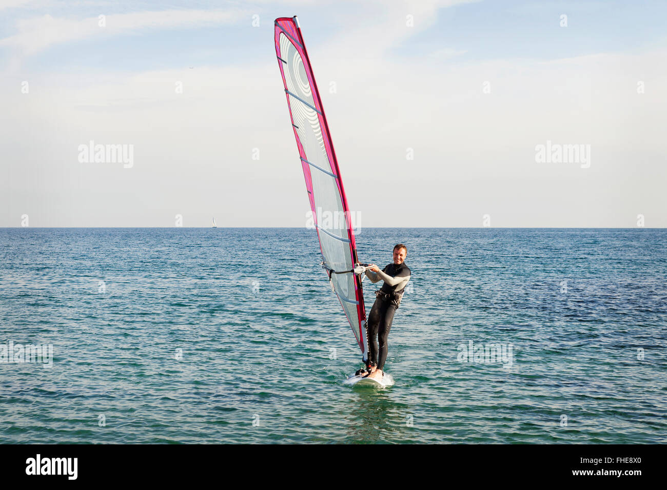 Windsurfing man hi-res stock photography and images - Alamy