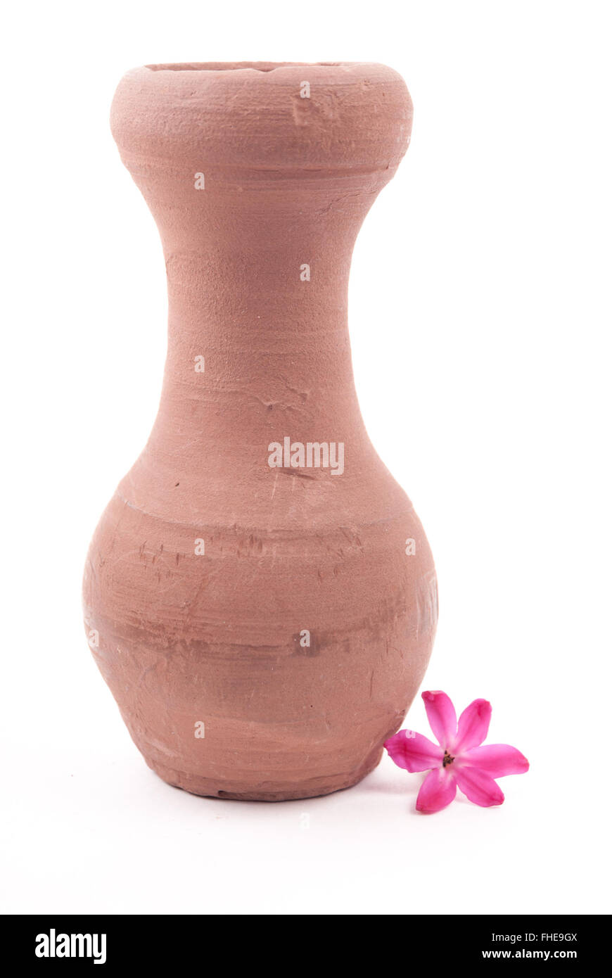 Clay jar with flower Stock Photo - Alamy