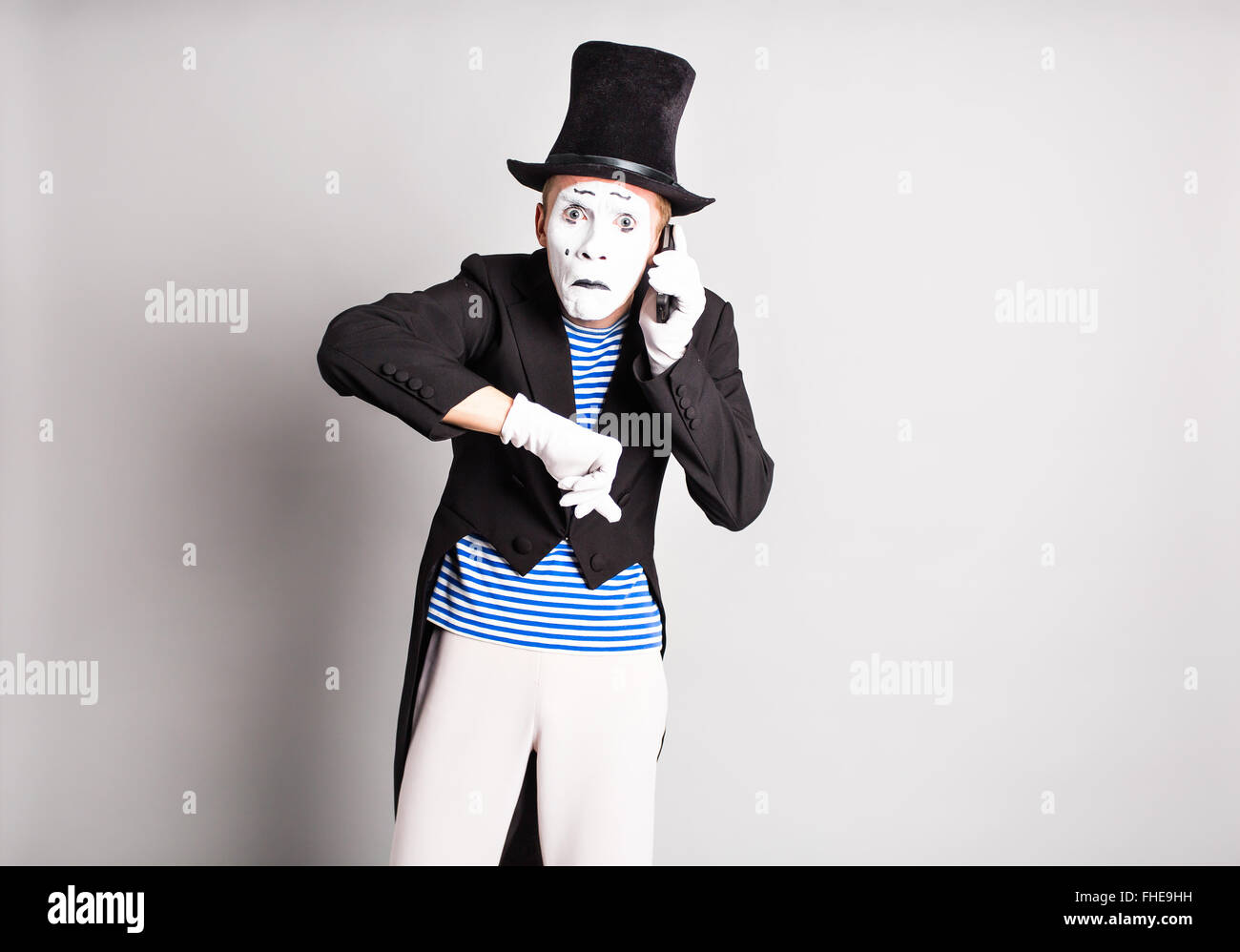 Business and time management concept. Stressed man looking at wrist ...