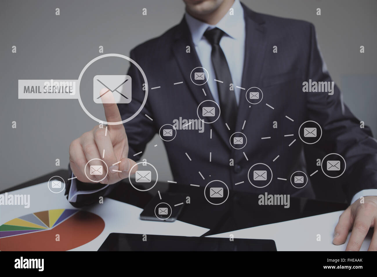 Businessman clicking on email icon. mail service Stock Photo - Alamy