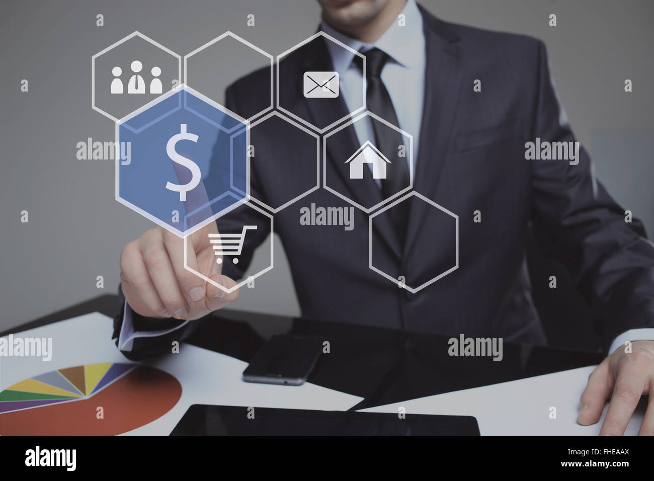 Businessman presses digital interface dollar sign Stock Photo - Alamy