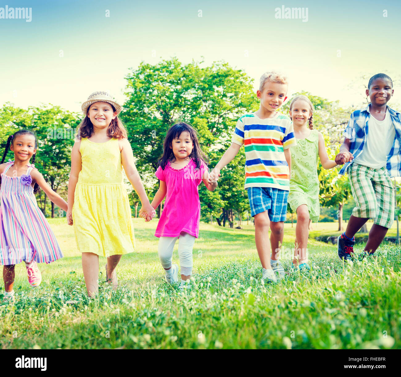 Children Kids Friendship Walking Happiness Concept Stock Photo - Alamy