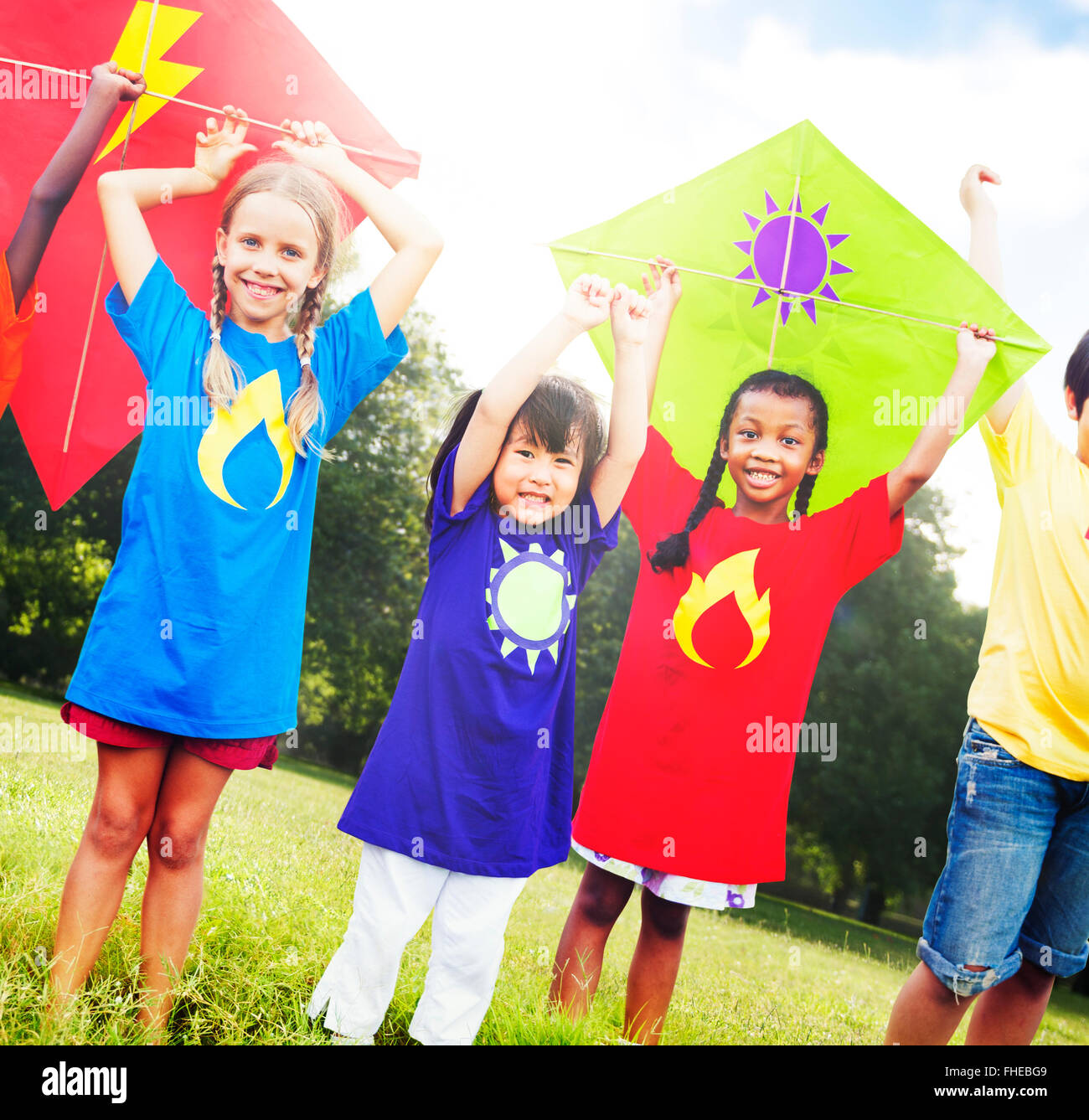 Children Flying Kite Playful Friendship Concept Stock Photo - Alamy