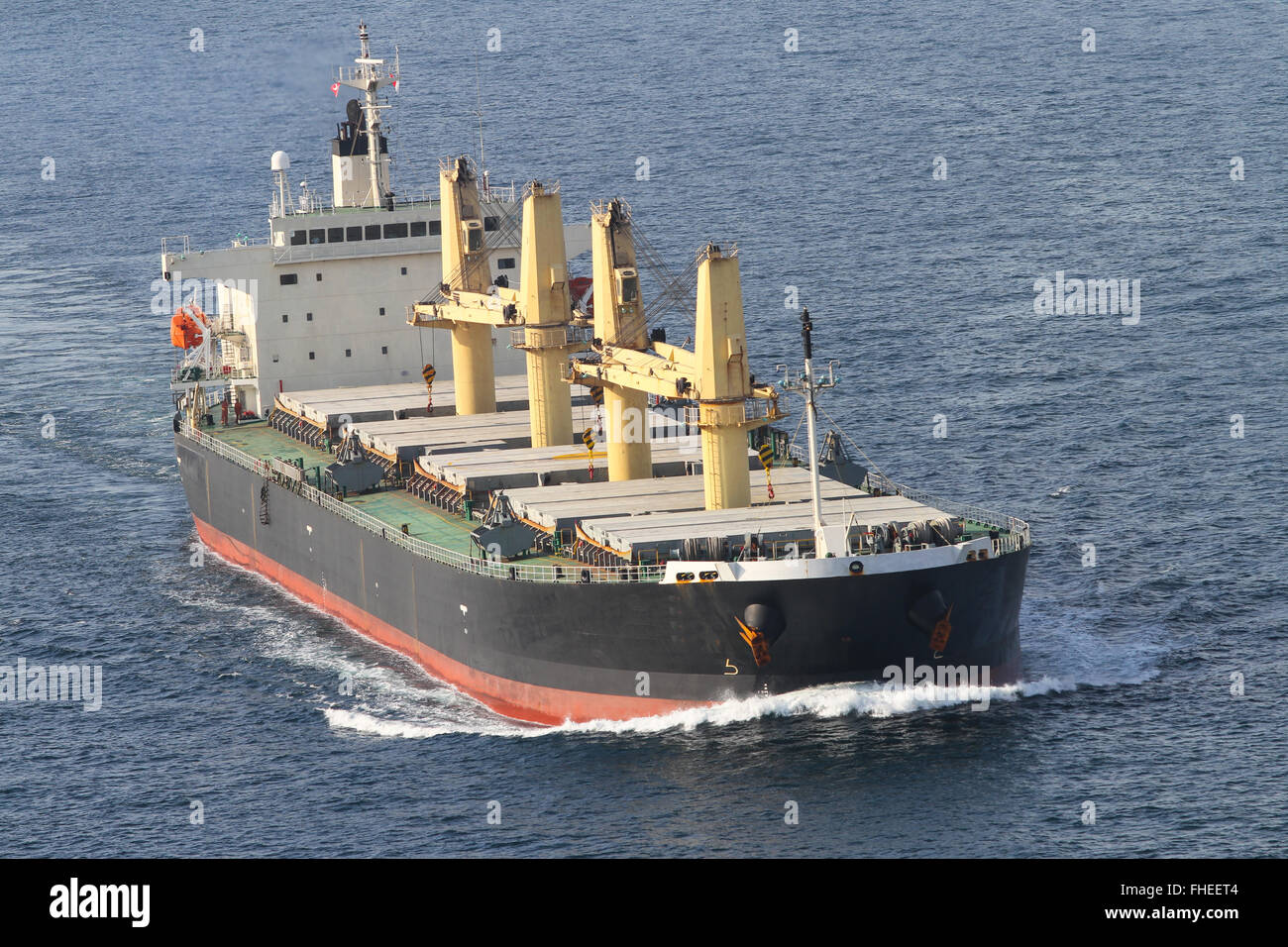 A cargo ship carrying goods between ports Stock Photo - Alamy