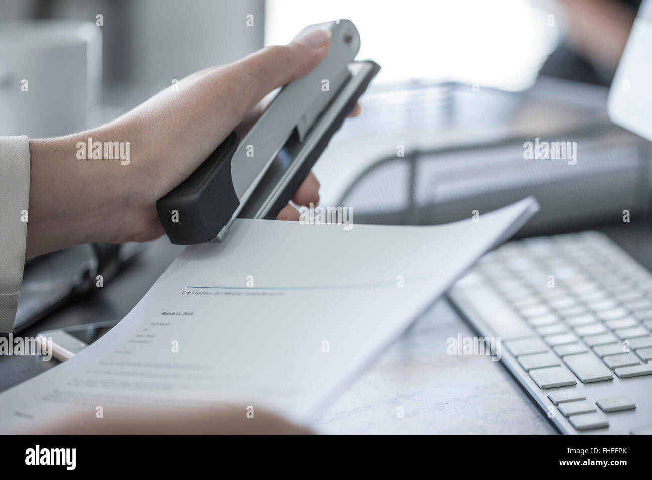 Stapling paper hi-res stock photography and images - Alamy