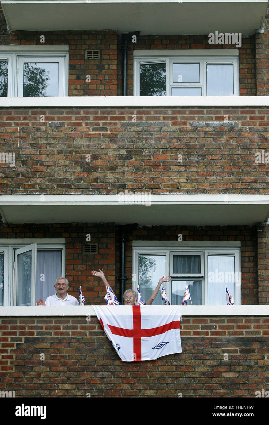 Residents of Jubilee Street in Stepney Green, east London watching a ...