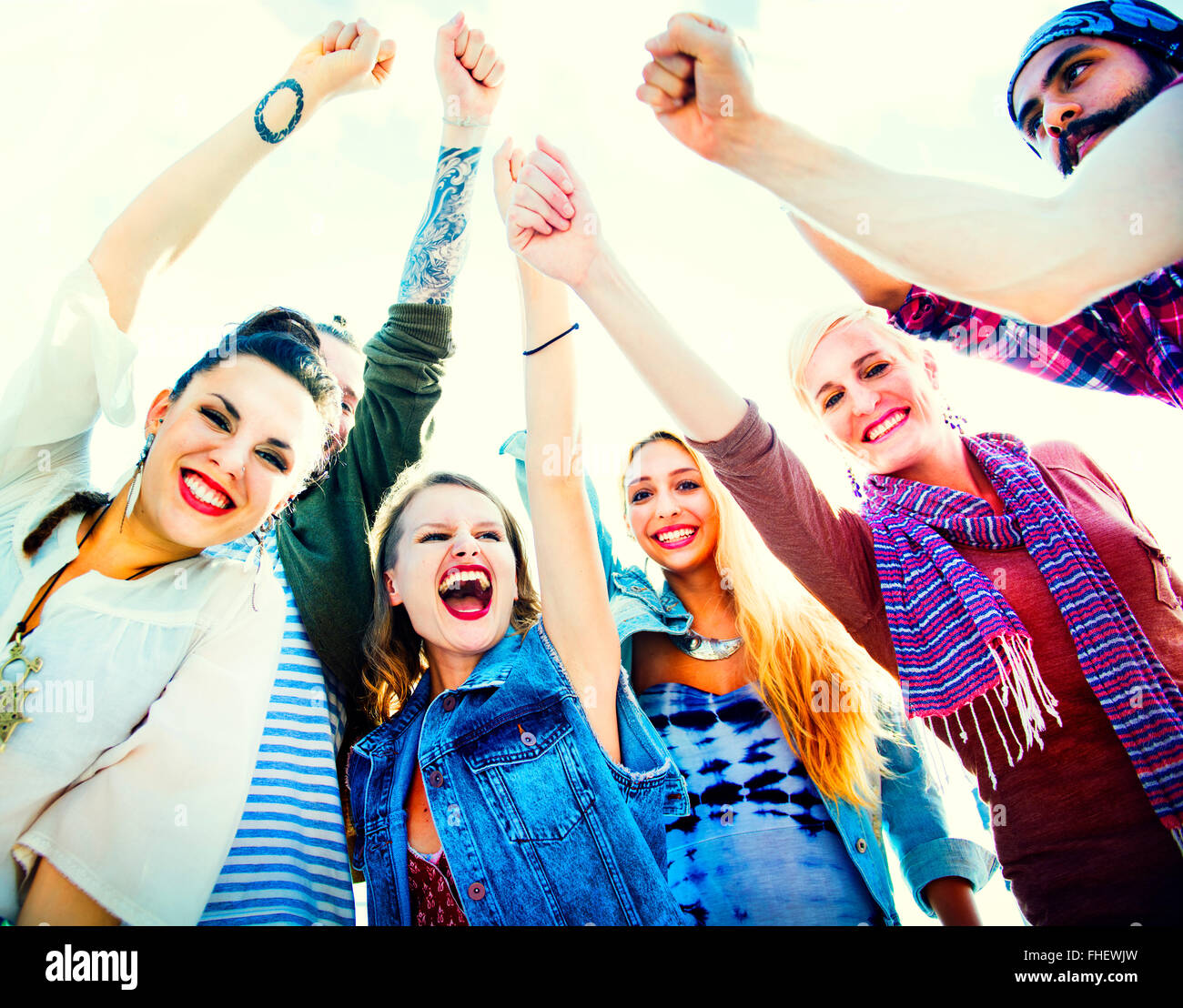 Friends Huddle Join Holiday Party Group Concept Stock Photo - Alamy