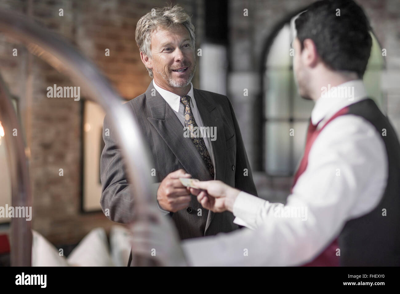 Bell boy in hotel hi-res stock photography and images - Alamy