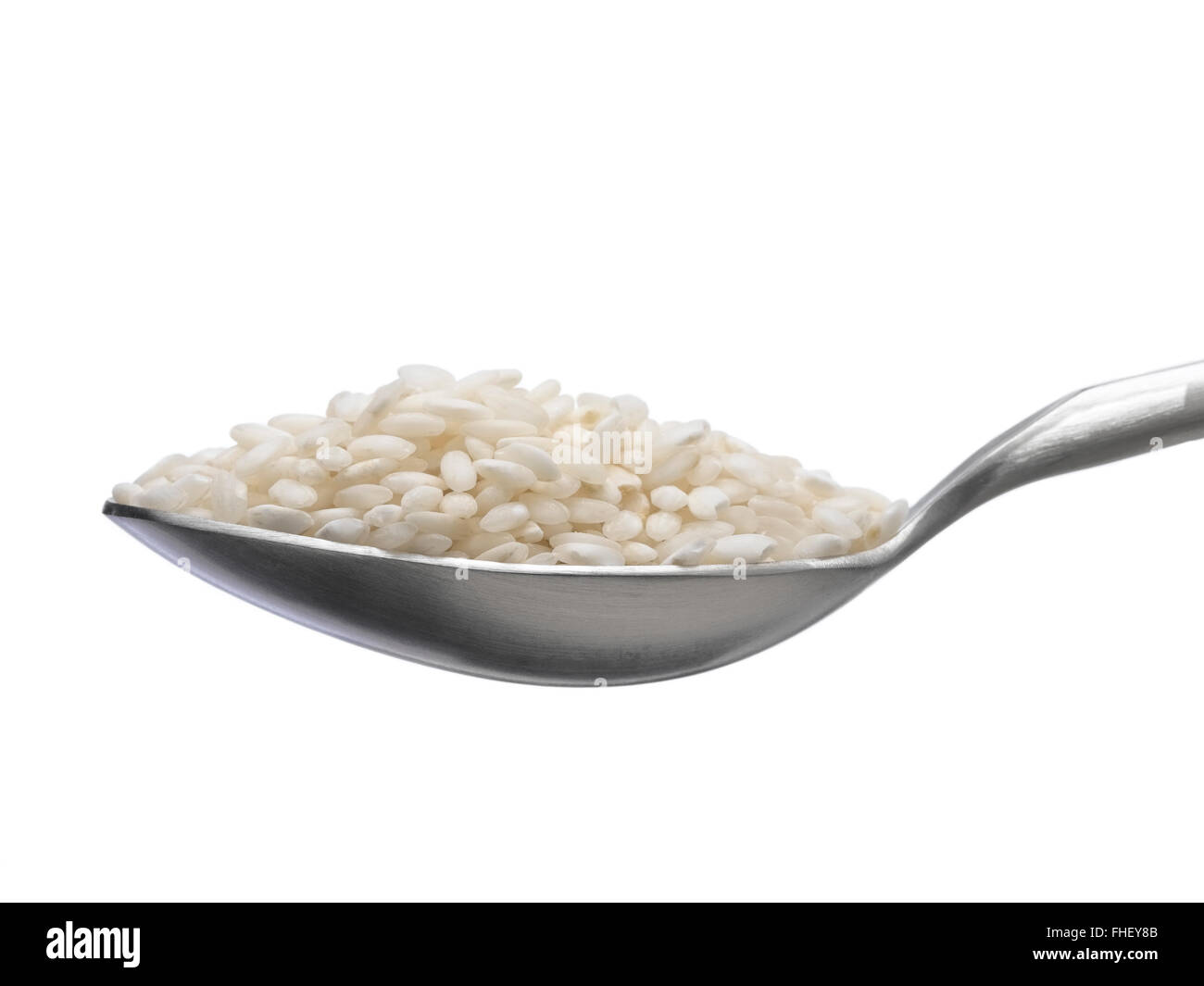 Aborio Rice isolated on a Spoon Stock Photo - Alamy