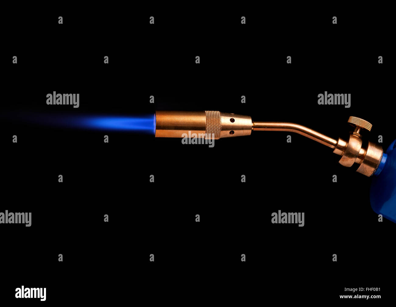 Blowtorch on black Stock Photo - Alamy