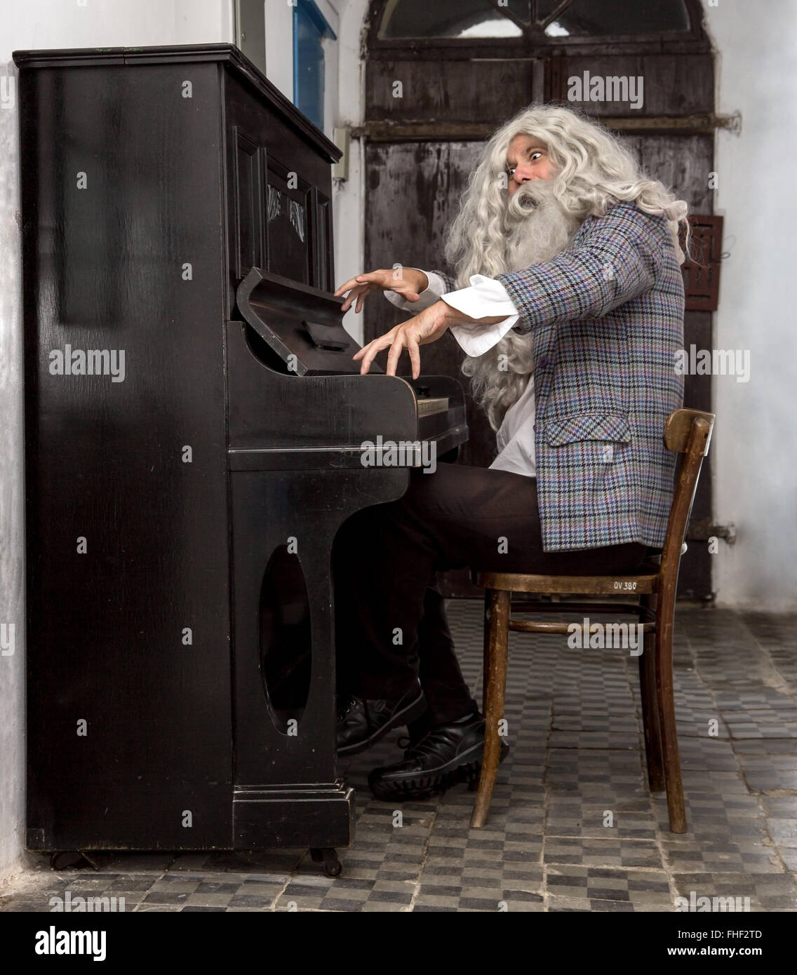 bearded musician plays the piano Stock Photo - Alamy