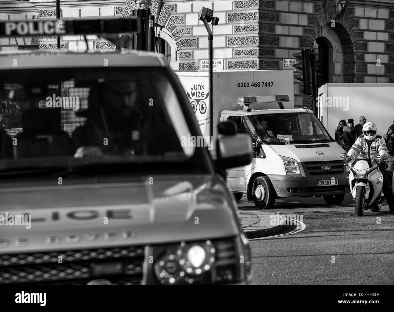 Police Range Rover and Motorbike with white van Stock Photo - Alamy