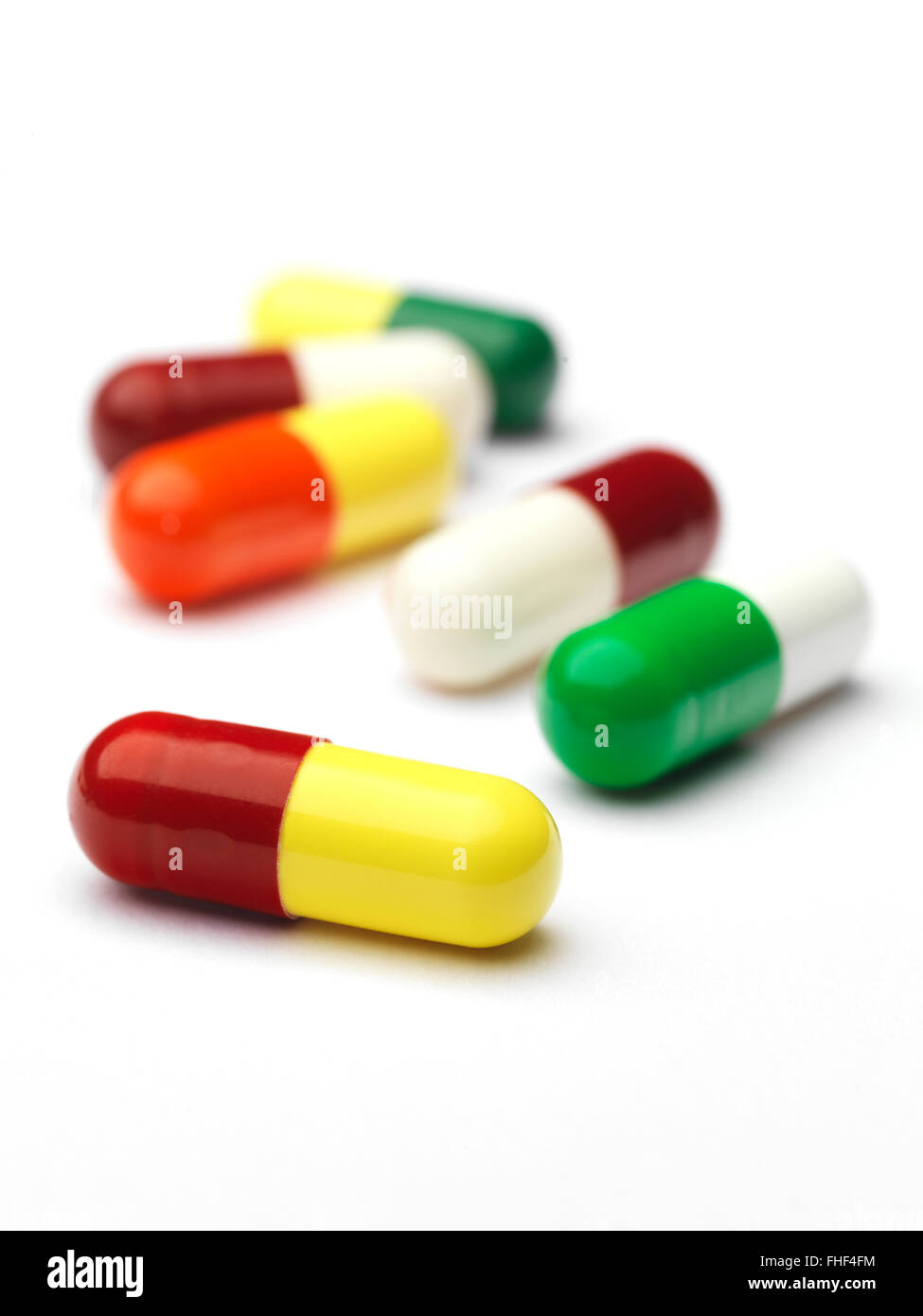 Capsule on white background Stock Photo - Alamy