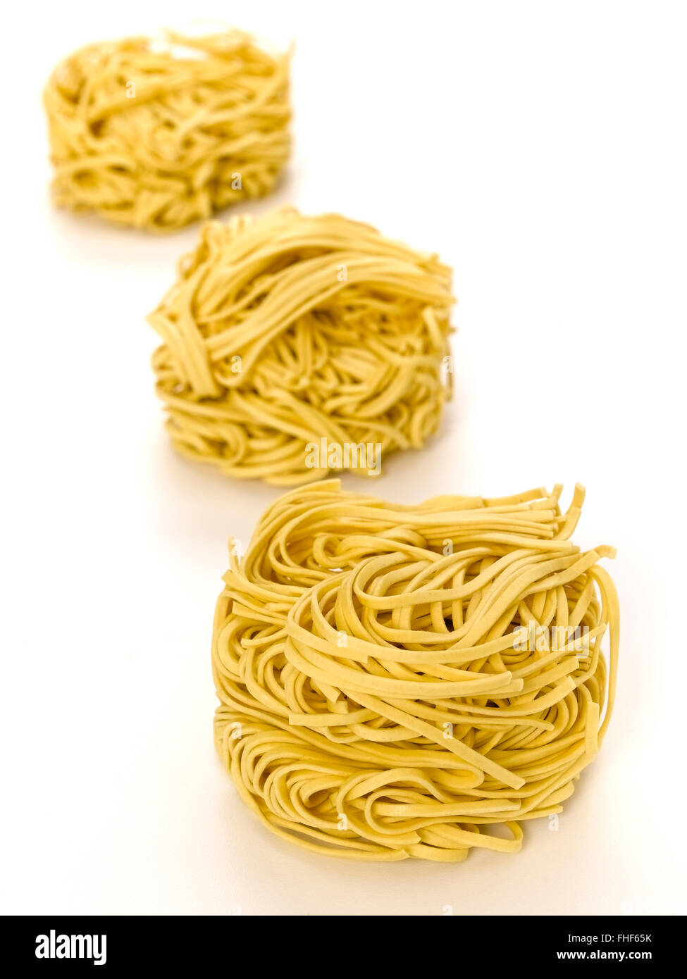 Noodle in a line Stock Photo - Alamy