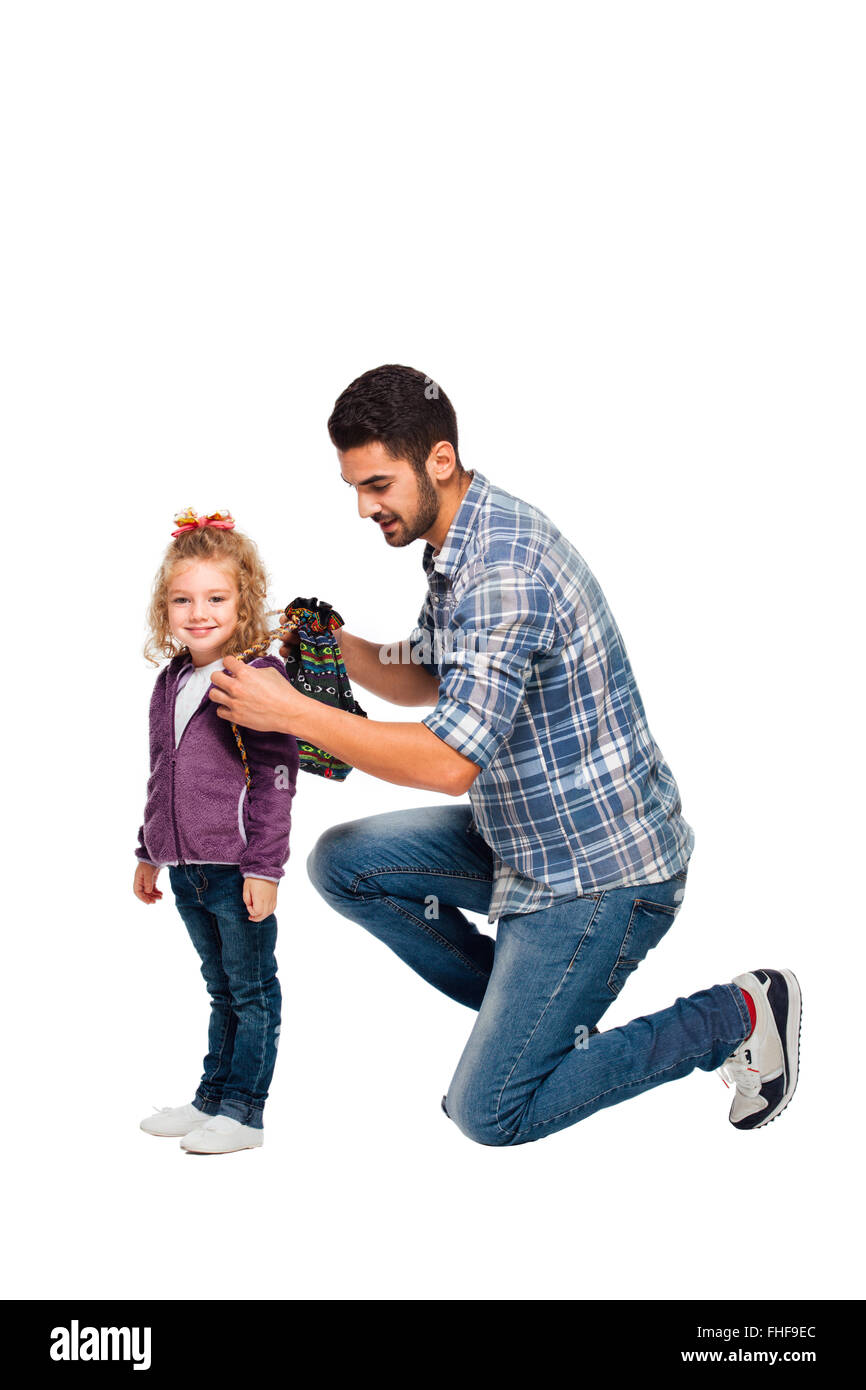 Father taking his child to school Cut Out Stock Images & Pictures - Alamy