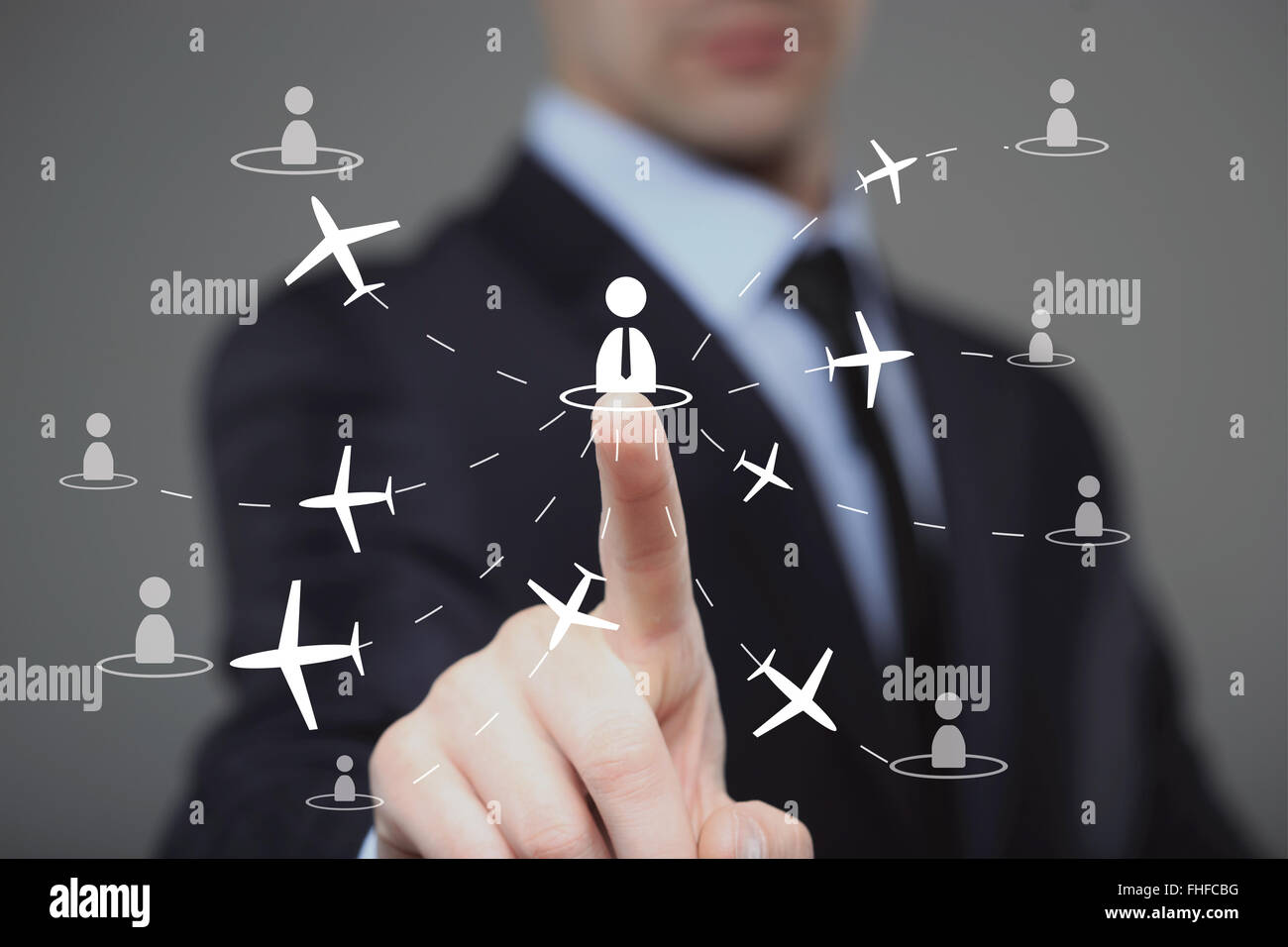 businessman clicks on the icon employee travel Stock Photo - Alamy