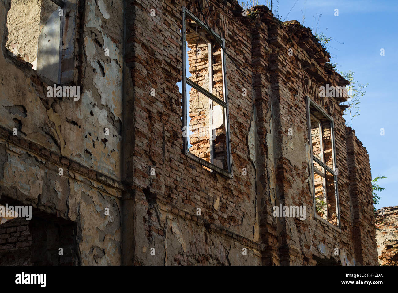 Brick ruined house wall Stock Photo - Alamy