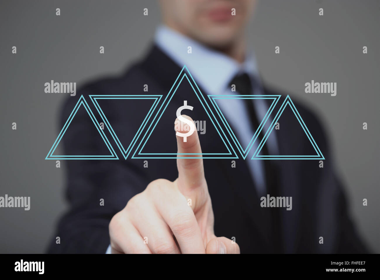 Businessman presses digital interface dollar sign Stock Photo - Alamy